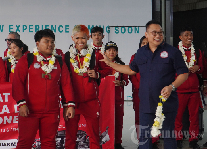 Kedatangan Atlet Timnas MMA, Foto 4 #2021469 - TribunNews.com