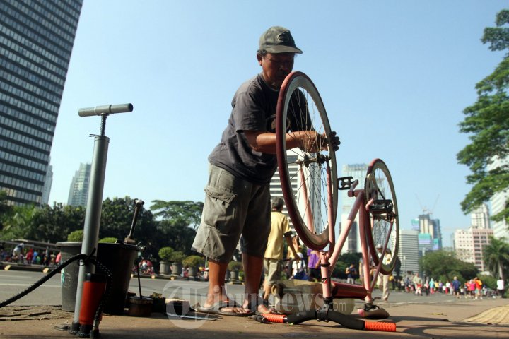 Seamat Tukang Tambal Ban, Foto 4 #1596086 - TribunNews.com